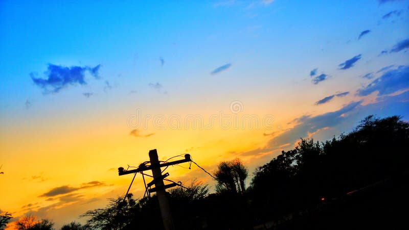 Electricity Pole with Beautiful Sunset Background. Clouds with Electric ...