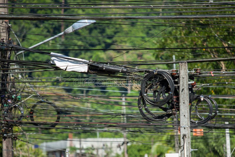 Electricity Pole Cables Bonded in a Intersection Stock Photo - Image of ...