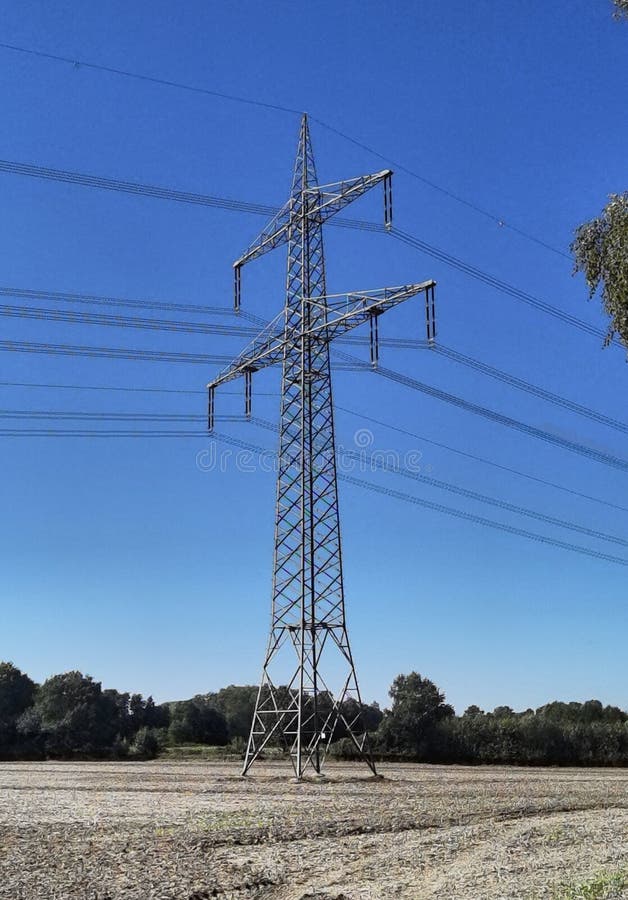 Electricity Pole in the Field Stock Photo - Image of mill, mast: 257865480
