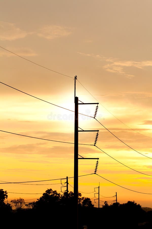 Electricity Pole with Sunset Stock Image - Image of pole, blue: 51965425
