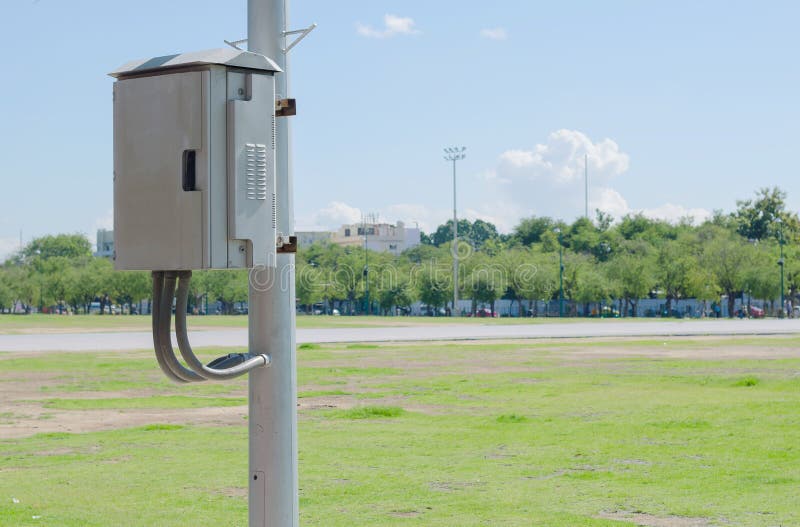 Electricity Post and Control Box in the Park. Stock Photo - Image of ...