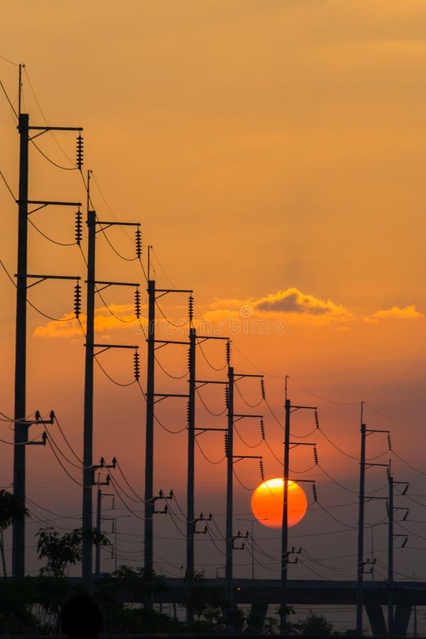 Electricity Post in Front of Sunset Background Stock Image - Image of ...