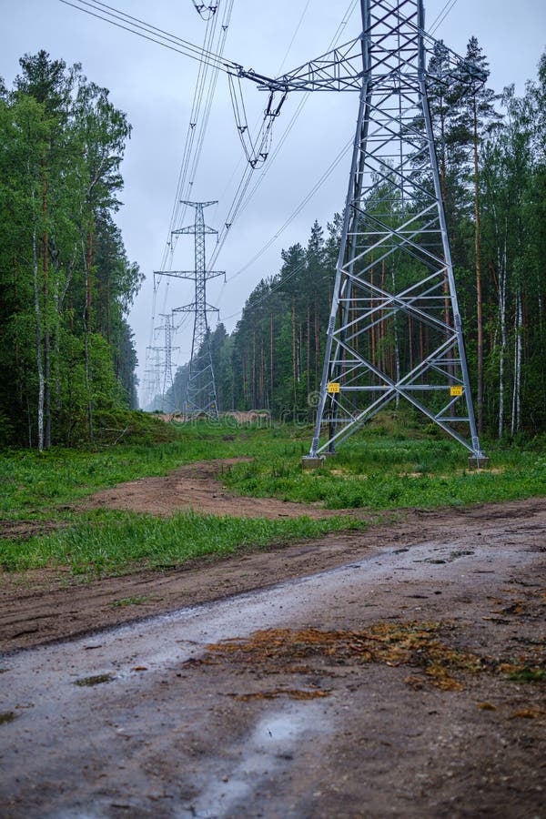 Electricity Power Line Poles Construction in Middle of Fields in ...