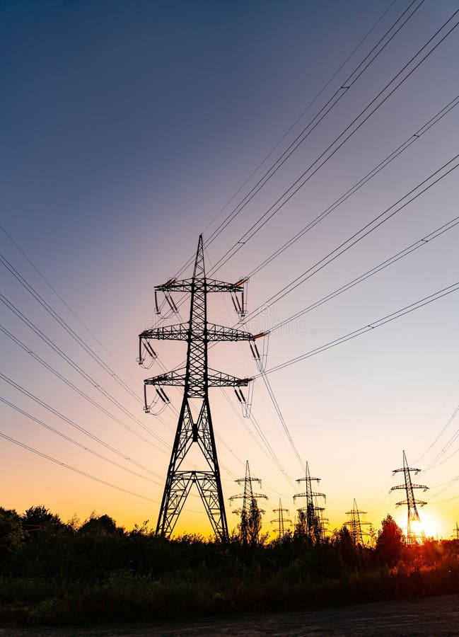 Electricity Power Station at the Backdrop of Blue Sky and Setting Sun ...