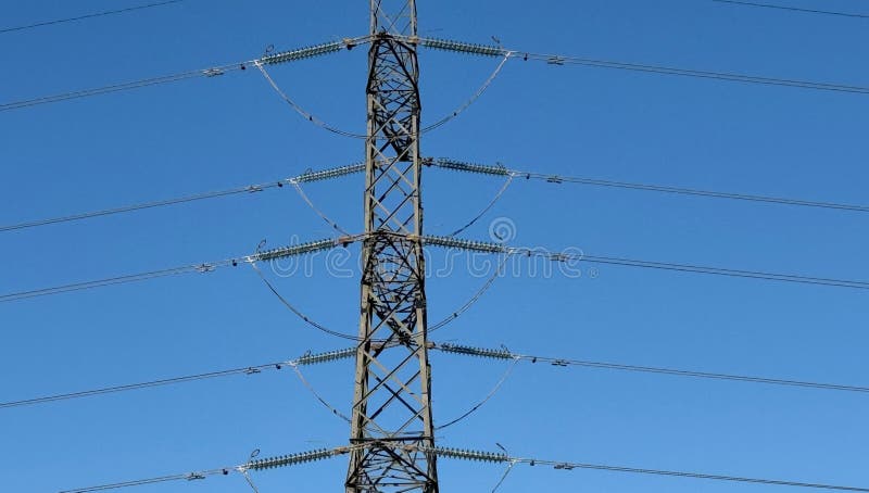 Electricity Pylon Against Deep Blue Sky on Fine Day Stock Photo - Image ...
