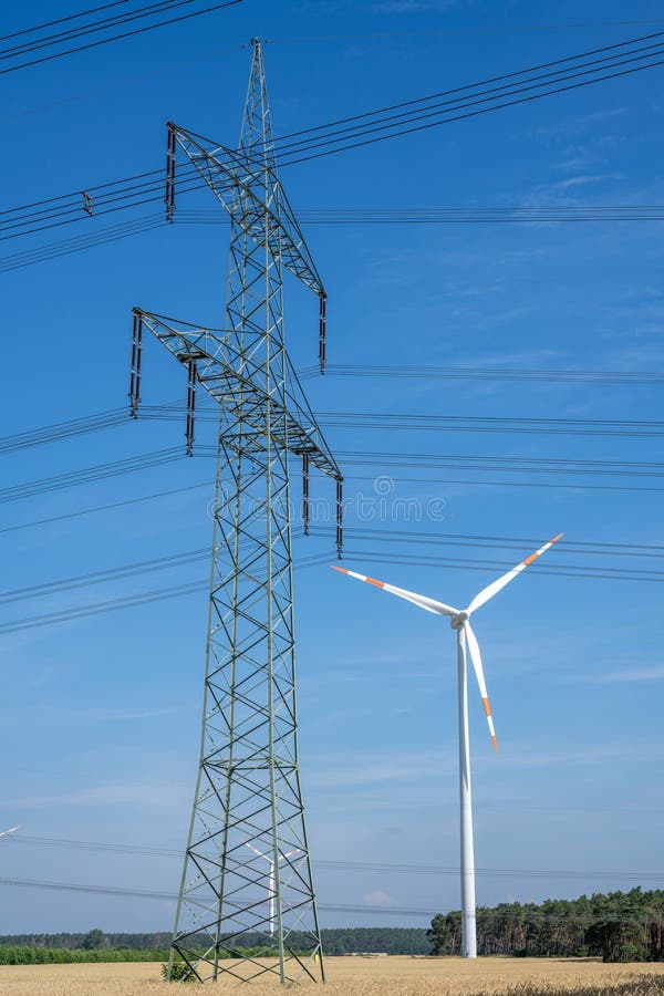 Electricity Pylon, Wind Turbine and Power Cables Editorial Image ...