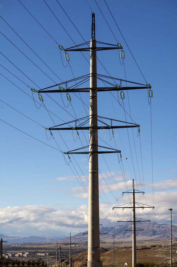 Electricity pylons stock image. Image of equipment, clouds - 61711179