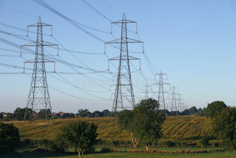 Electricity Pylons Over Countryside Stock Image - Image of blue, force ...