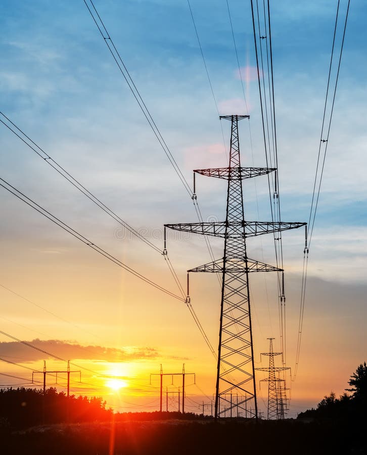 Electricity Pylons and Power Lines, at Sunset. Stock Image - Image of ...
