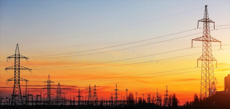 Electricity Pylons and Power Lines on Sunset Sky Stock Photo - Image of ...