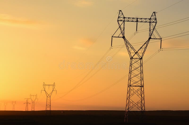 Electricity Pylons at Sunset Stock Photo - Image of power, outdoors ...