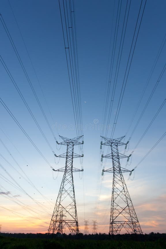 Electricity Pylons at Sunset Stock Photo - Image of current, pole: 19418968
