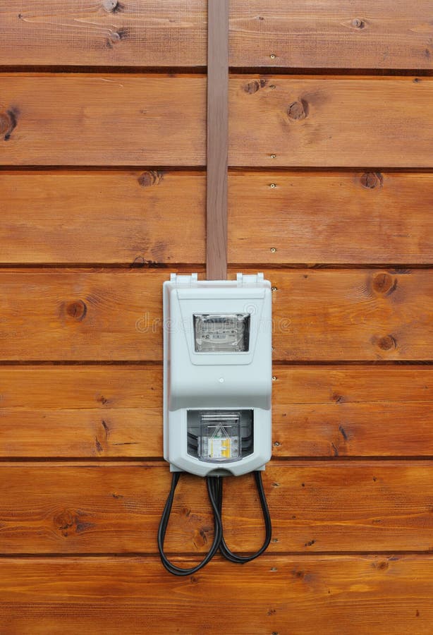 Electricity Supply Meter on Wooden Wall Front View Stock Photo - Image ...