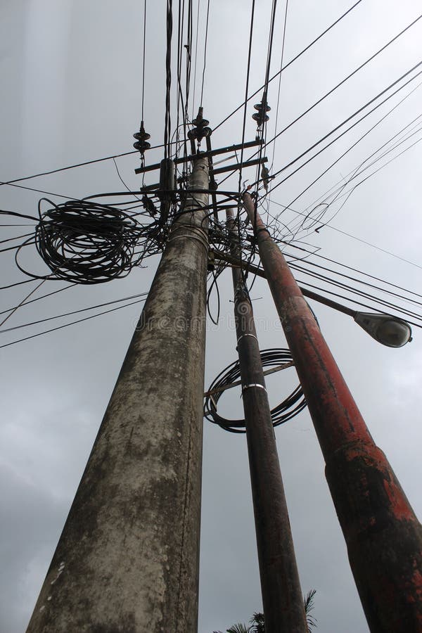 Electricity and Telecom Poles with Cable Connections. Stock Photo ...