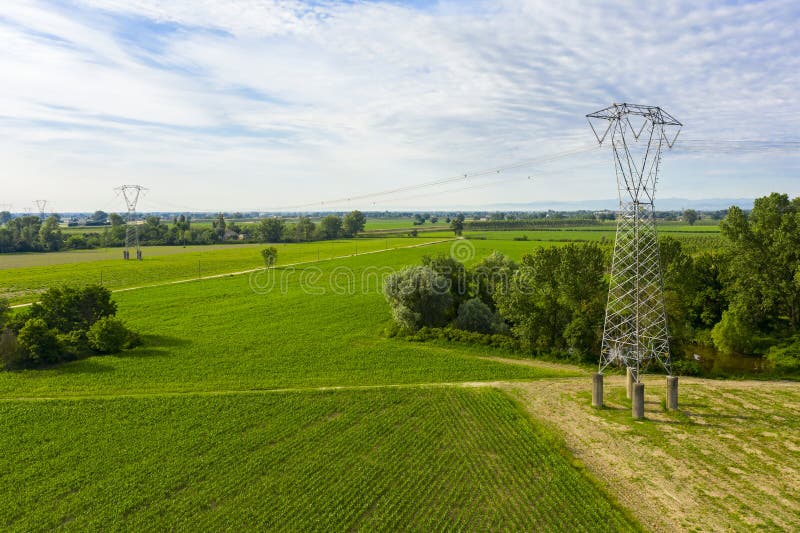 Electricity Tower in a Wonderful Field Stock Image - Image of cable ...