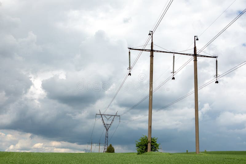 Electricity Transmission Pylon Silhouetted Against Blue Sky Stock Image ...