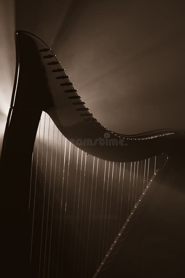 Electro Harp in the Rays of Light Stock Photo - Image of harpist ...