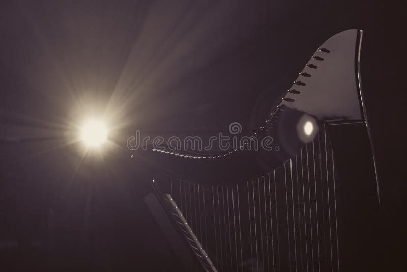 Electro Harp in the Rays of Light Stock Photo - Image of orchestral ...