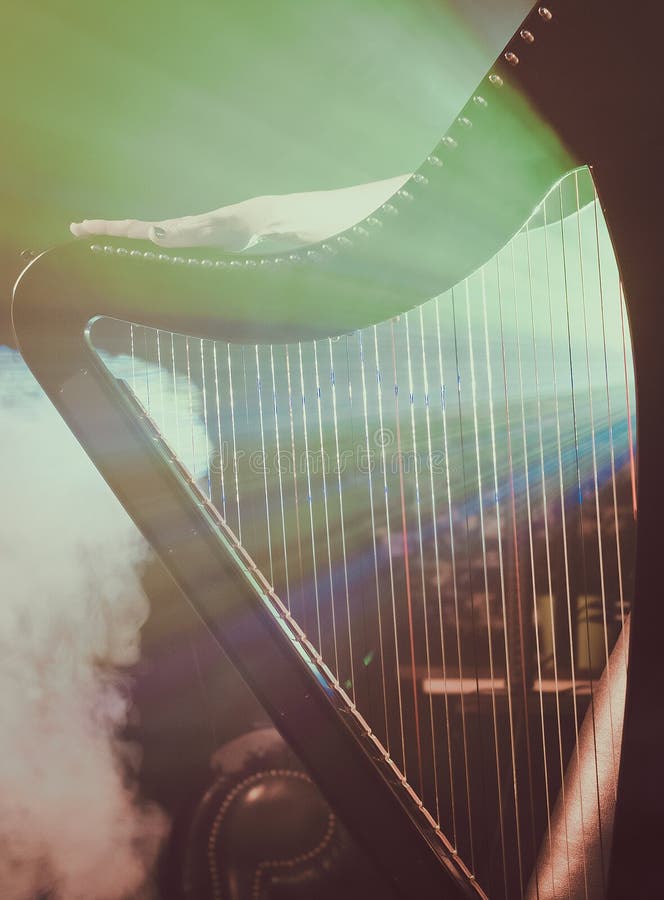 Electro Harp in the Rays of Light Stock Photo - Image of classic ...