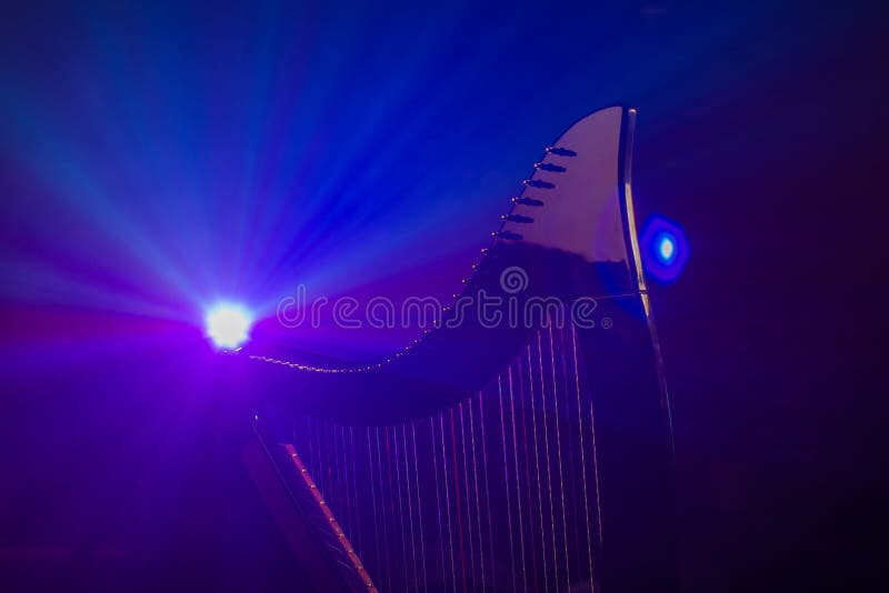 Electro Harp in the Rays of Light Stock Photo - Image of musical, music ...