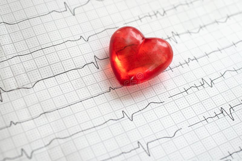 Electrocardiogram and Red Plastic Heart-shaped Object, Heart Concept ...