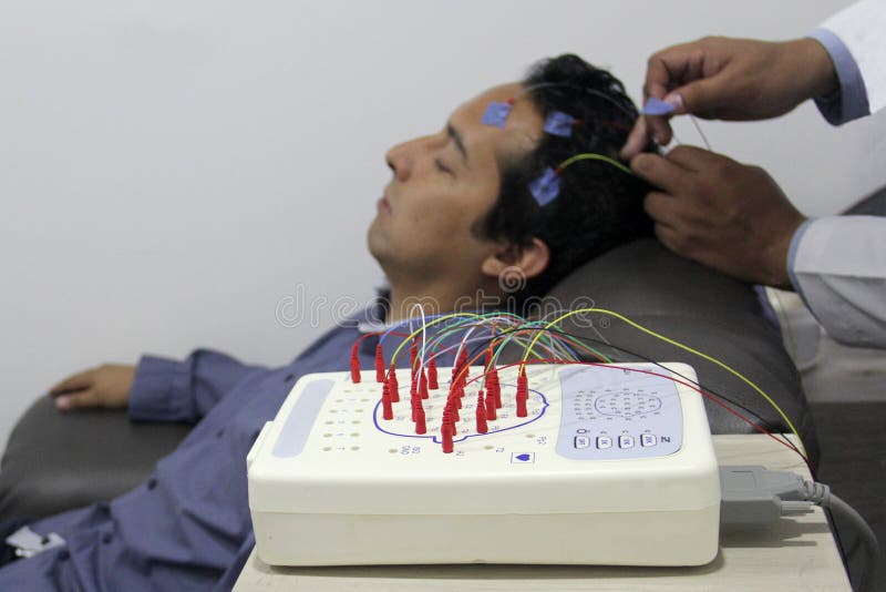Electroencephalogram EEG in Man with Wires, Study that Records the ...