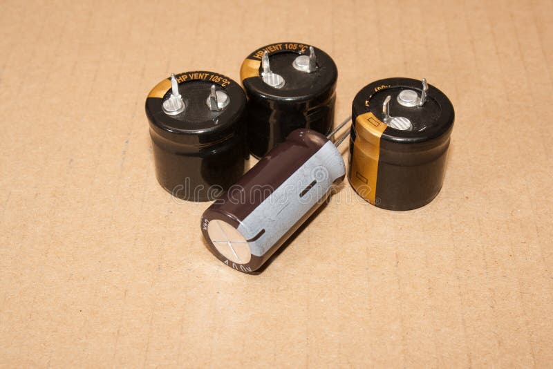 Electrolytic condensers stock image. Image of relay, components - 26578989