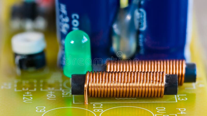 Electromagnetic Coils, Green LED Light and Electronic Components on ...