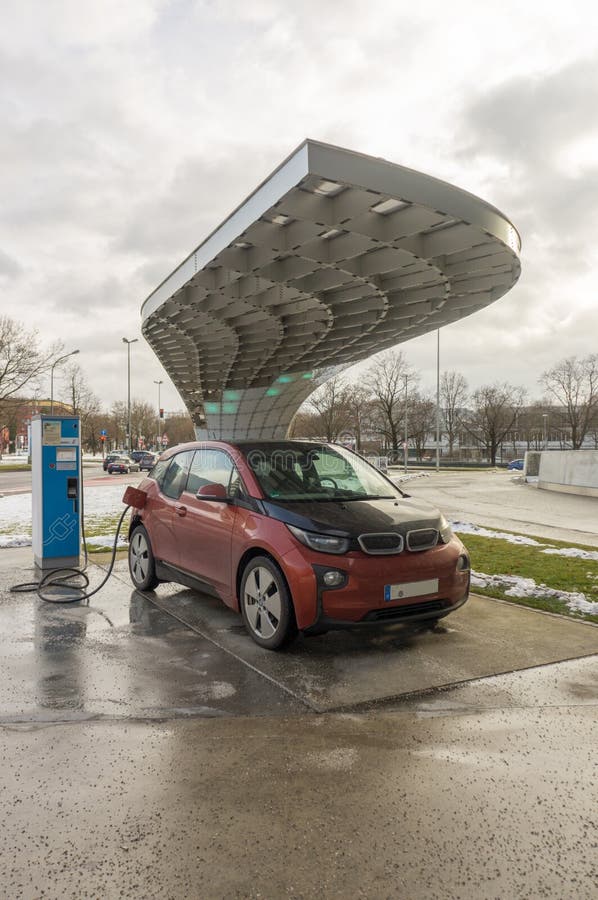 Electromobile at charging editorial stock image. Image of modern - 76046619