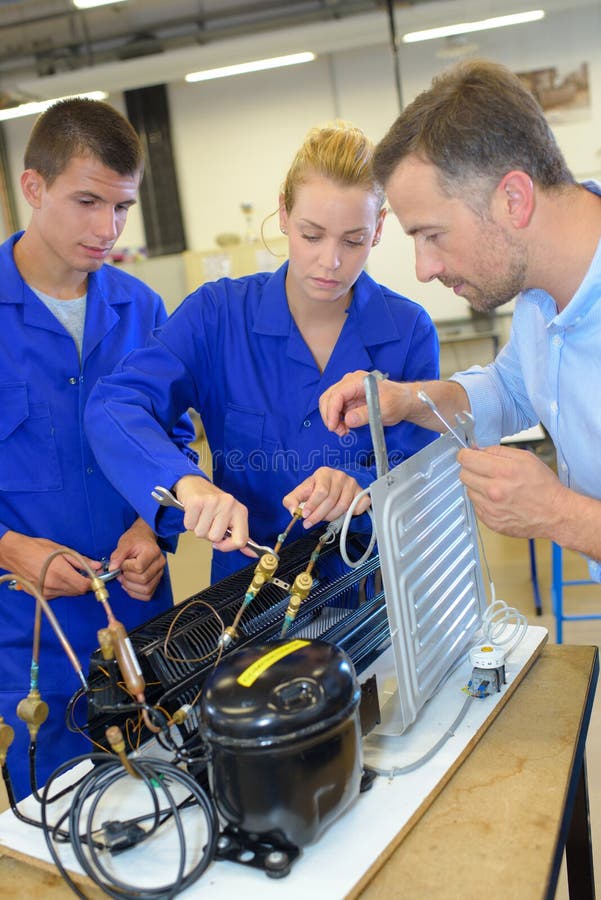 Electronic Assemblers at Work Stock Photo - Image of repair, supervise ...