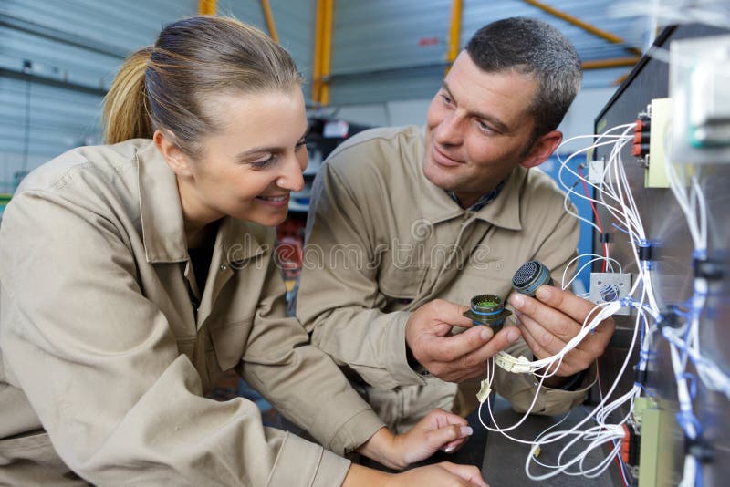 Electronic Assembling Apprentice Looking at Wires Stock Image - Image ...