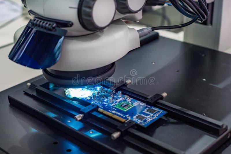 Close Up of Examining of Test Sample of Microchip Transistor Under the ...
