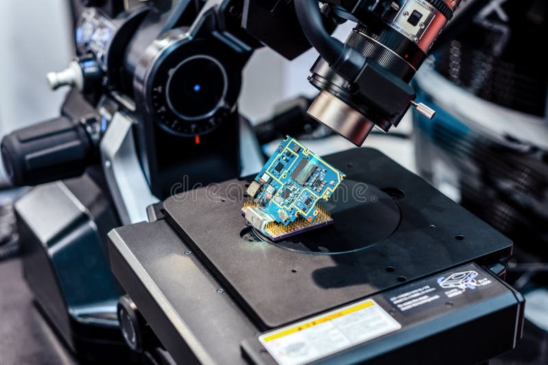 Close Up of Examining of Test Sample of Microchip Transistor Under the ...