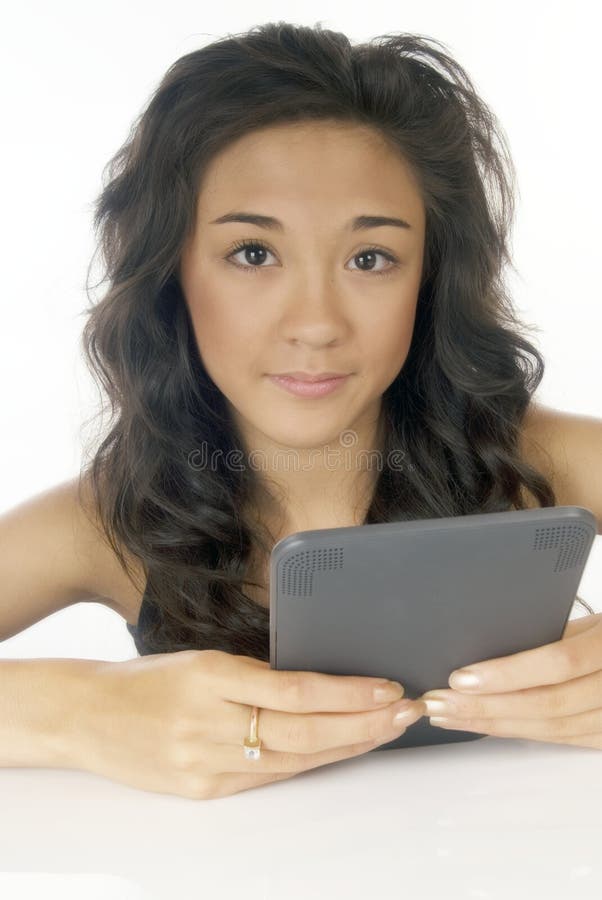 Electronic Book on the Top of the Stack of Regular Old Books Isolated ...