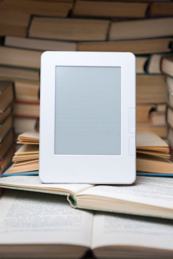 Electronic Book on the Top of the Stack of Regular Old Books Isolated ...