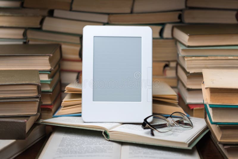 Electronic Book on the Top of the Stack of Regular Old Books Isolated ...