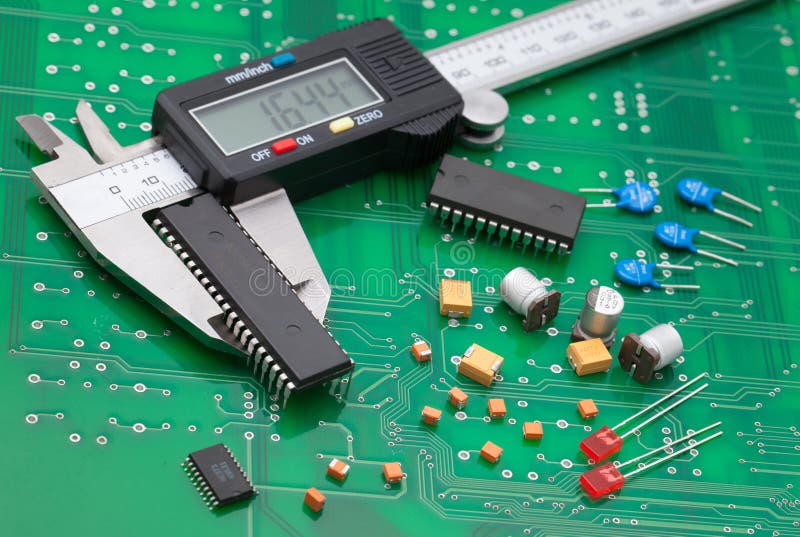 Electronic Caliper Measure IC and Electronic Part on Green Pcb Stock ...