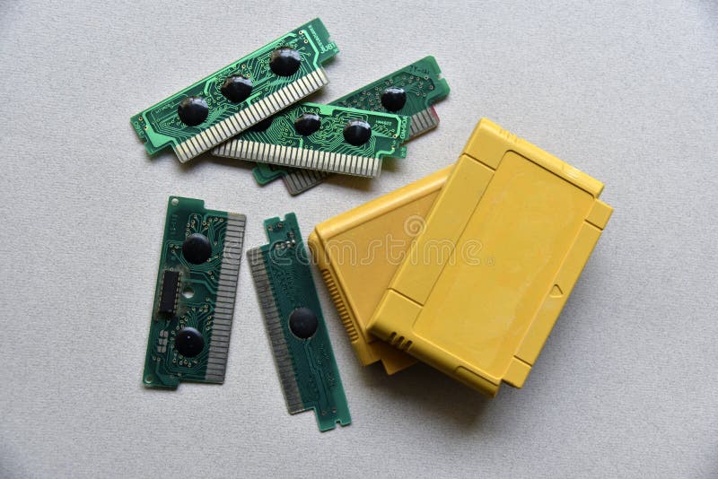 Electronic Cartridge Board for Retro Game Console. a Yellow Plastic ...