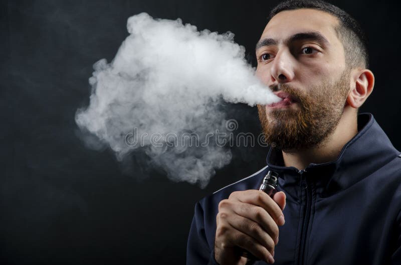 Electronic Cigarette Mods for Ecig Over a Black Background. Vape ...