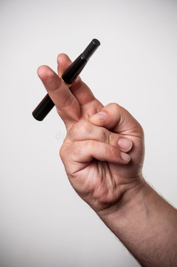 Electronic Cigarette and a Real Cigarette Stock Photo - Image of ...