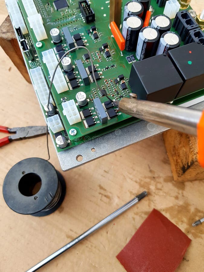 Electronic Circuit Board and Soldering Iron on a Workbench. Stock Image - Image of design, board ...