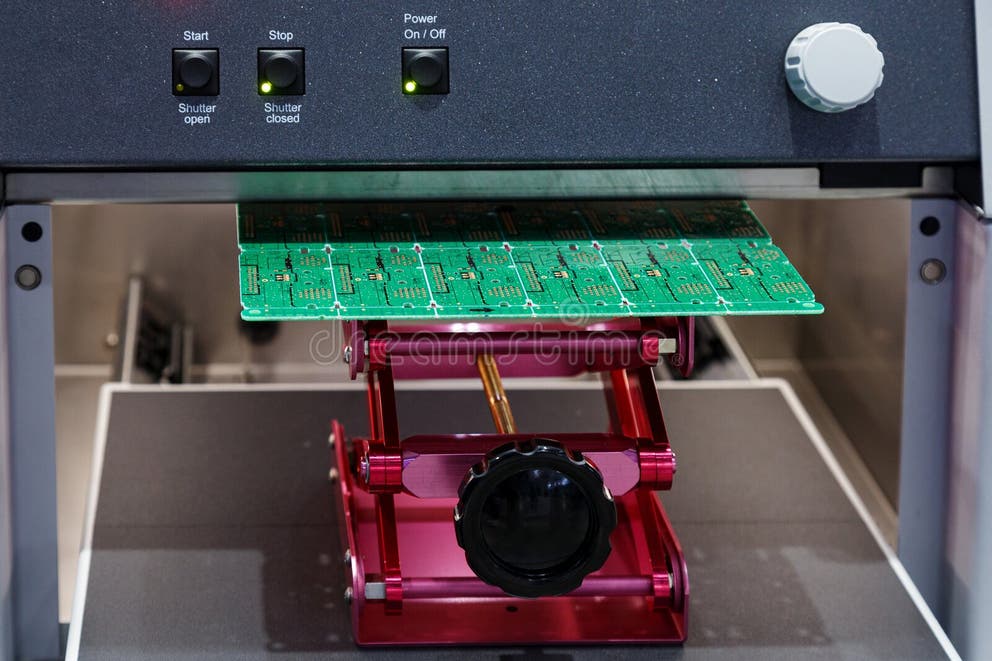 Electronic Circuit Board Under Processing Machine. Close-up of Green ...