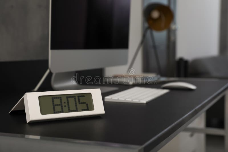 Electronic Clock Near Computer on Table Indoors, Space for Text ...