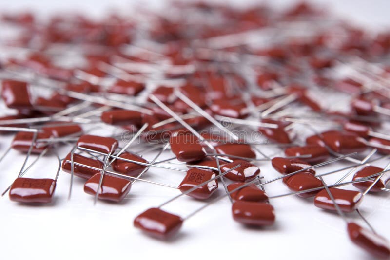 Electronic Components. Capacitors Placed Bulk on White Surface Stock ...