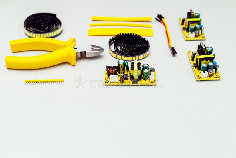 Electronic Device and Work Tools Yellow Color on Gray Background Stock ...