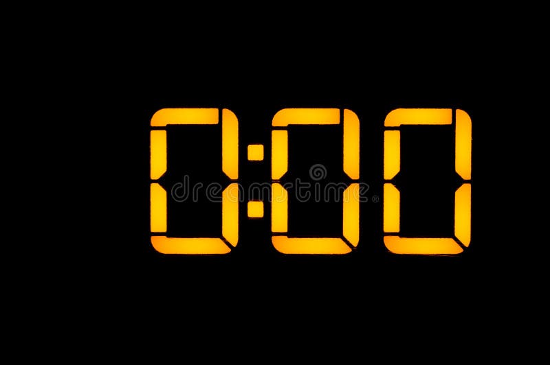 Electronic Digital Clock with Orange Numbers on a Black Background ...