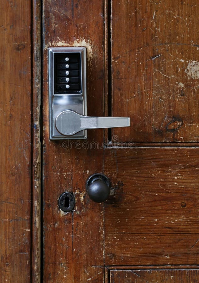 Electronic Door Handle with Numeric Buttons on Old Door Stock Image ...