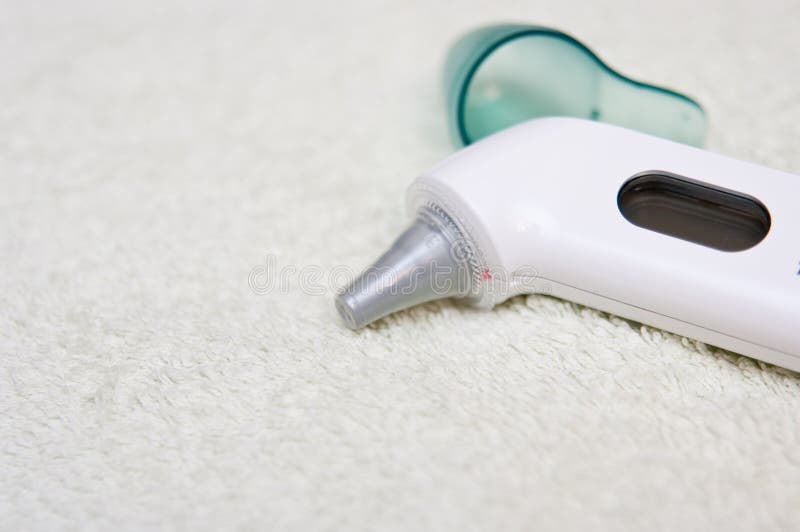 Electronic Ear Thermometer stock photo. Image of fever - 18835794
