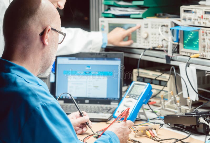 Electronic Engineer Designing and Developing a Hardware Product Stock ...