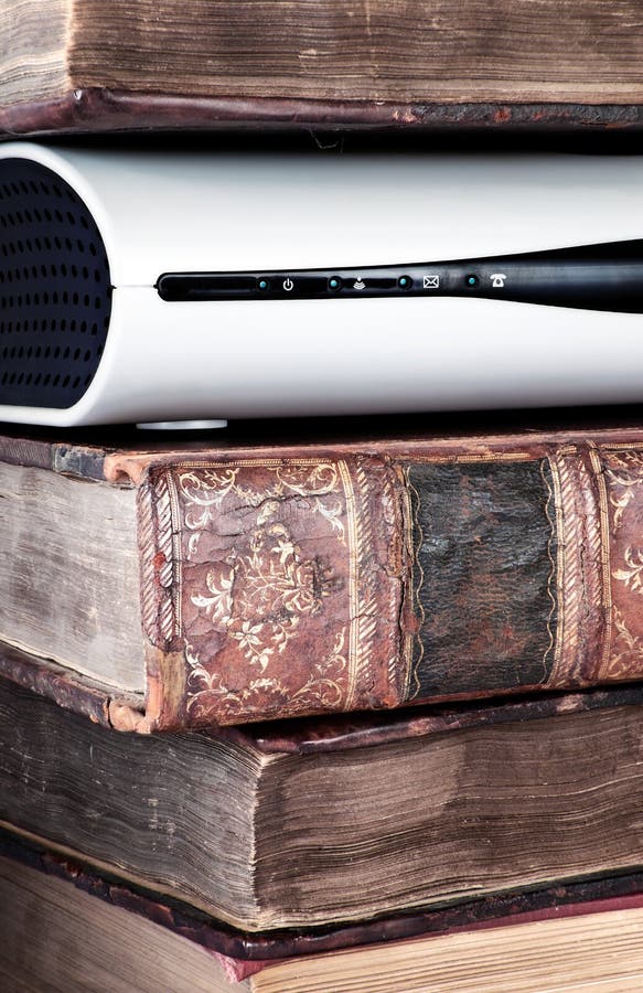 Electronic Equipment in a Pile of Old Books Stock Image - Image of ...